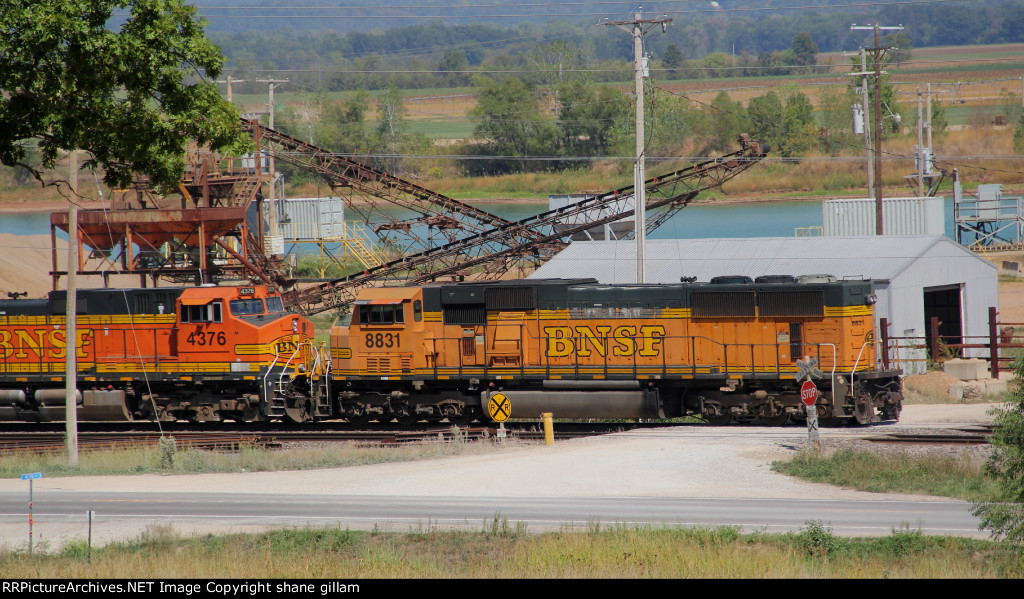BNSF 4376 and 8831 are dpue's on this load of coal.
